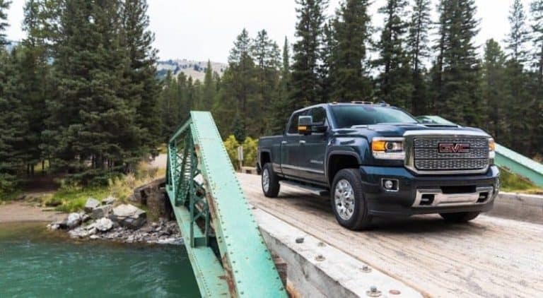 Battle of the Beasts: The Ford Raptor vs GMC Sierra AT4