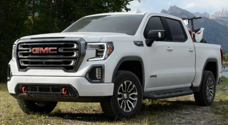 Battle of the Beasts: The Ford Raptor vs GMC Sierra AT4